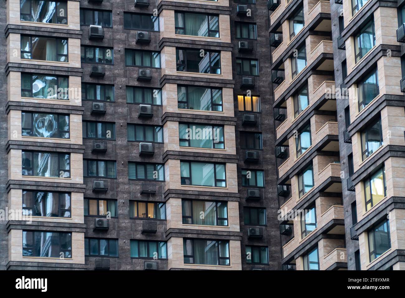 Apartments of a new multi-storey building from the outside. Facade and ...