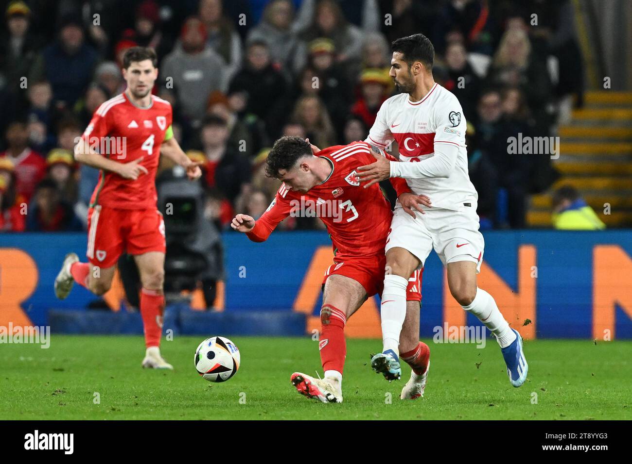 Neco Williams of Wales is fouled by Zeki Çelik of Turkey during the ...