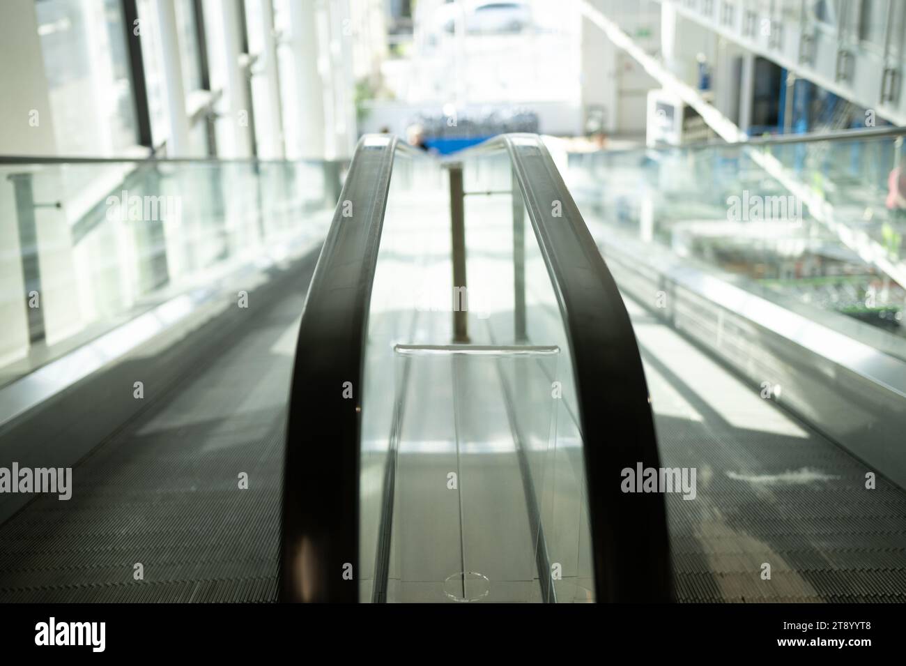 Moving walkway in a warehouse Stock Photo - Alamy