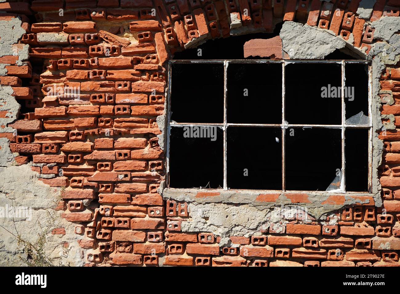 degraded window without glass inserted in a degraded wall Stock Photo ...