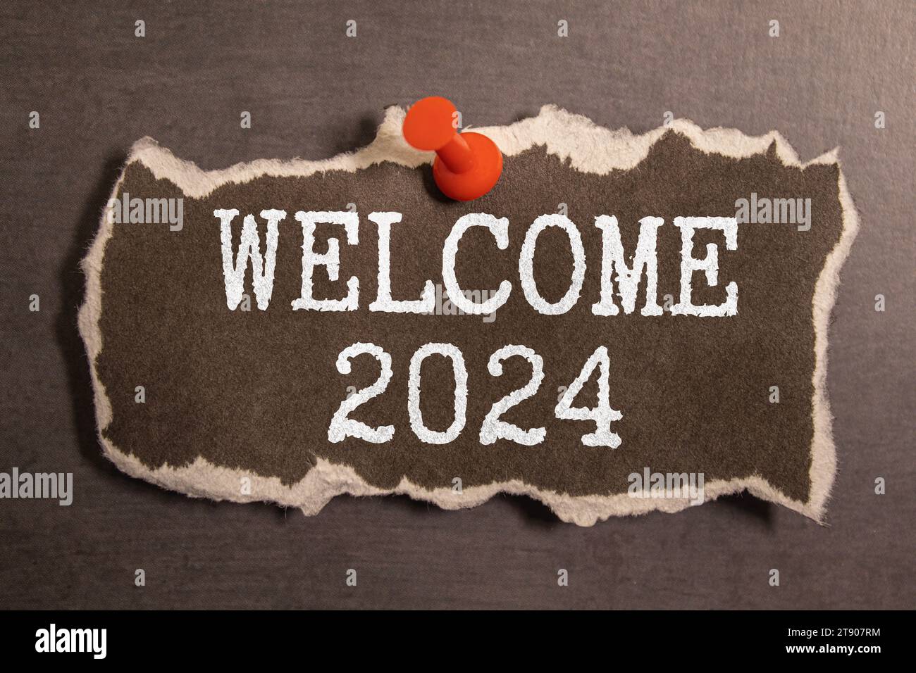 Welcome 2024 - New Year concept on a vintage slate blackboard isolated ...