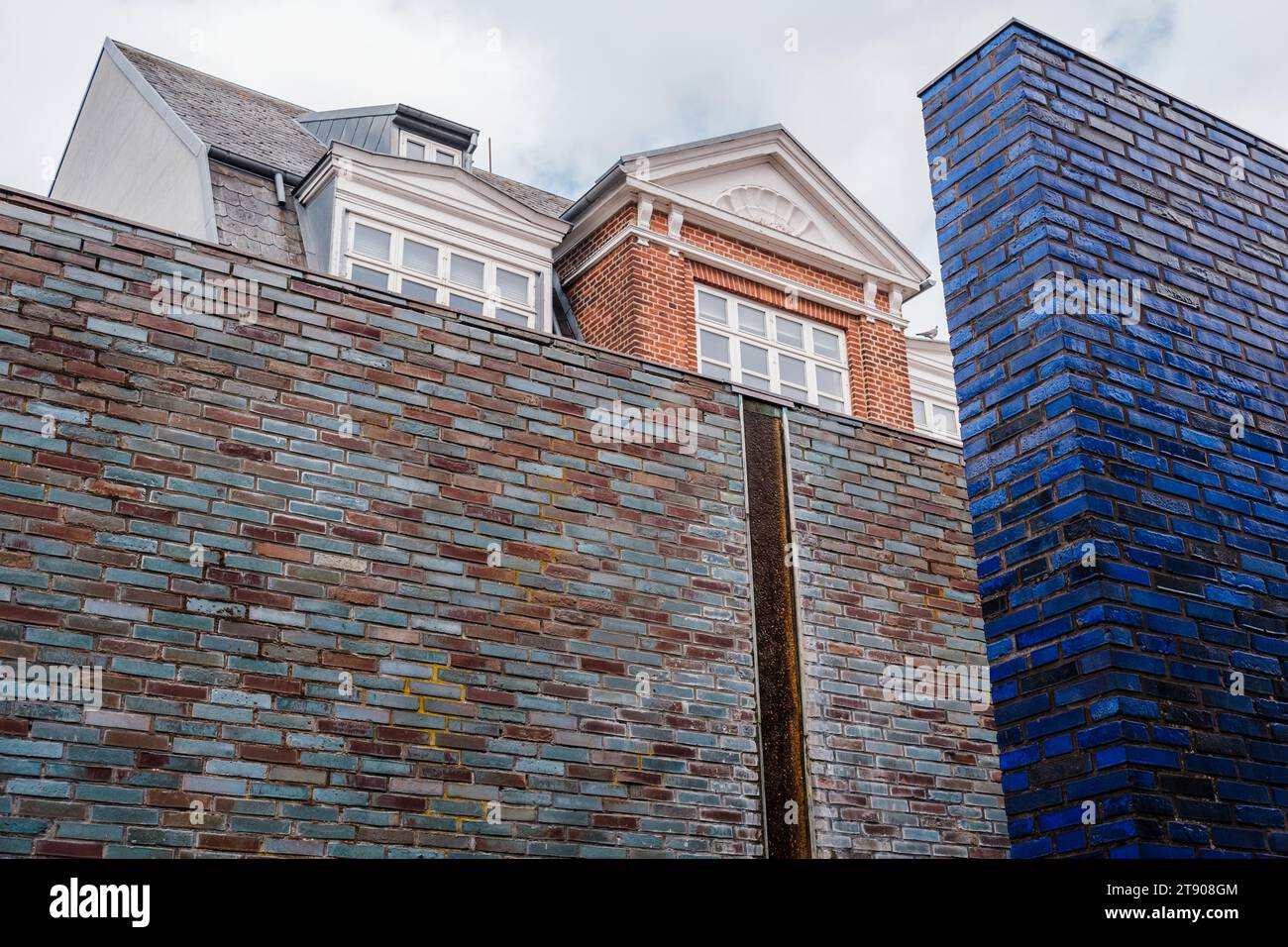 A bright blue painted brick wall, a background for cheerful masonry ...