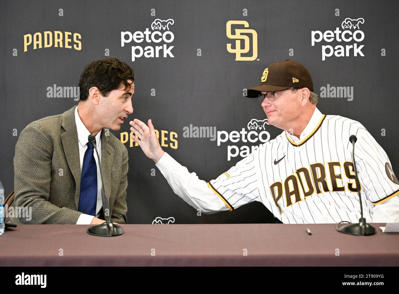 San Diego Padres general manager A.J. Preller, left, and San Diego ...