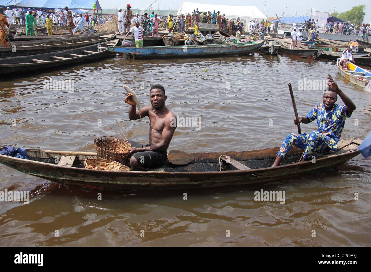 So Ava, Benin. 21st Nov, 2023. A fisherman shows a fish on the occasion ...
