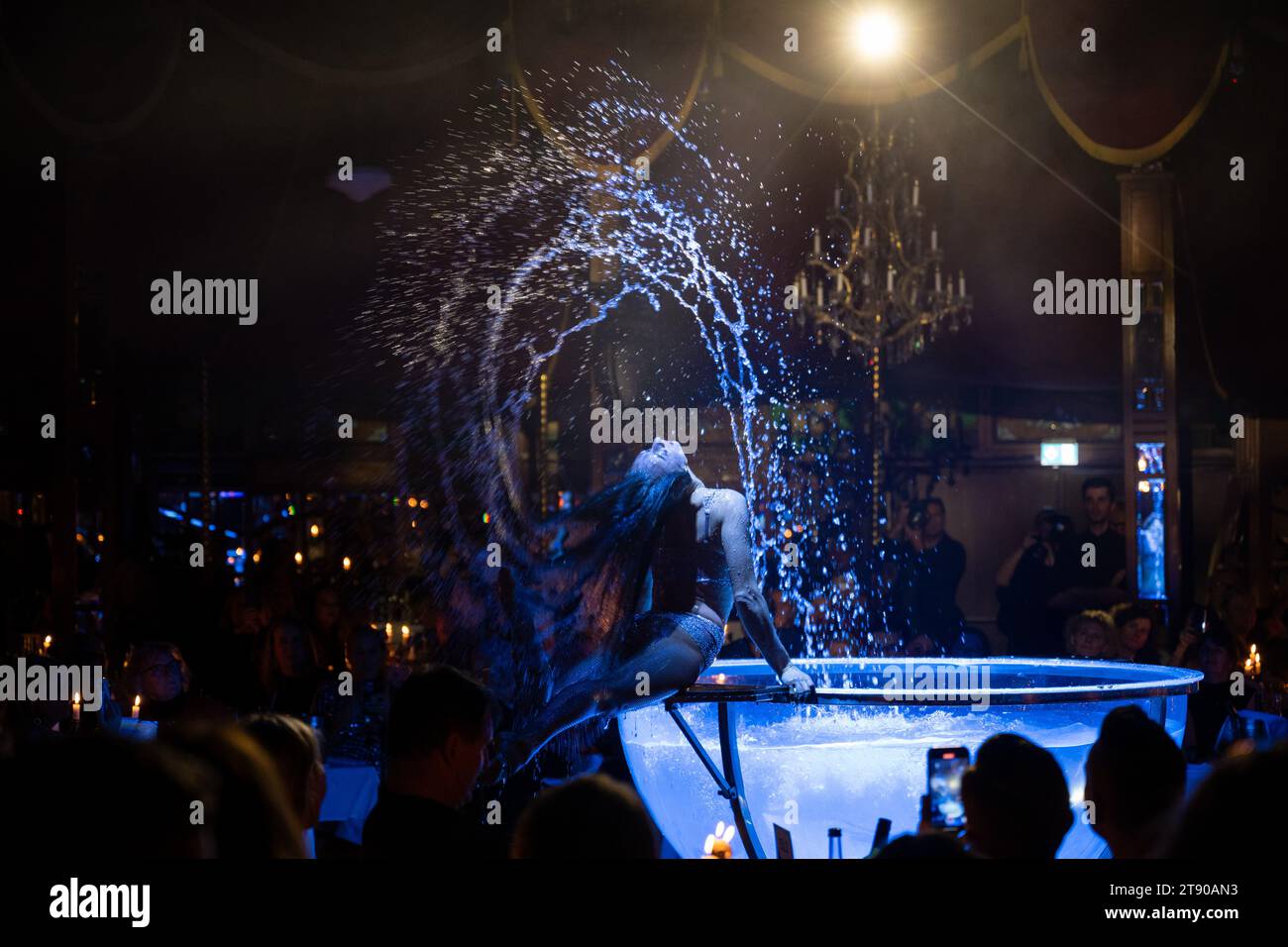 Munich, Germany. 21st Nov, 2023. An artist performs her water ...