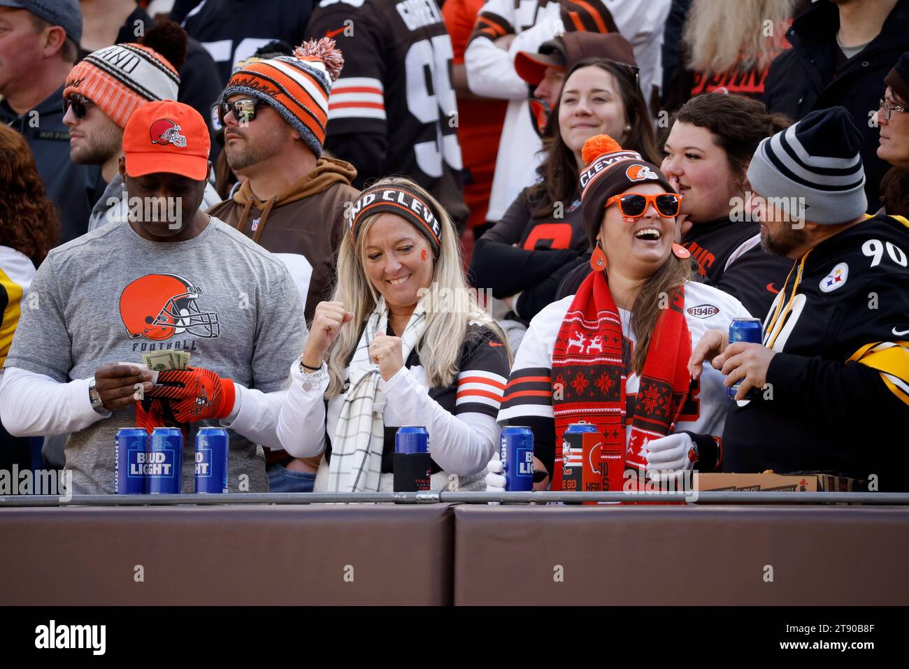Fans drink Bud Light during an NFL football game between the Cleveland ...