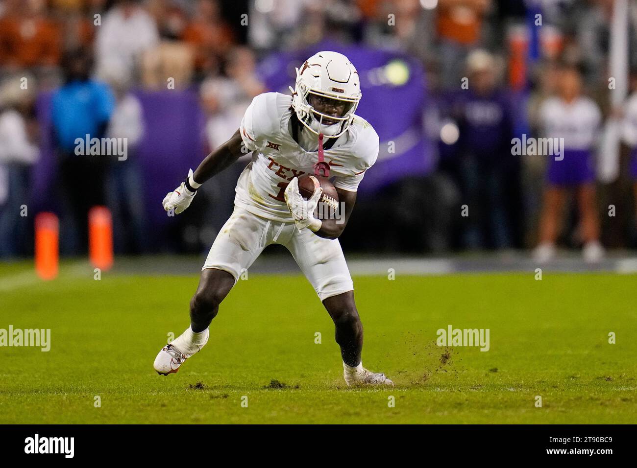 Texas wide receiver Xavier Worthy runs with the ball during the first ...
