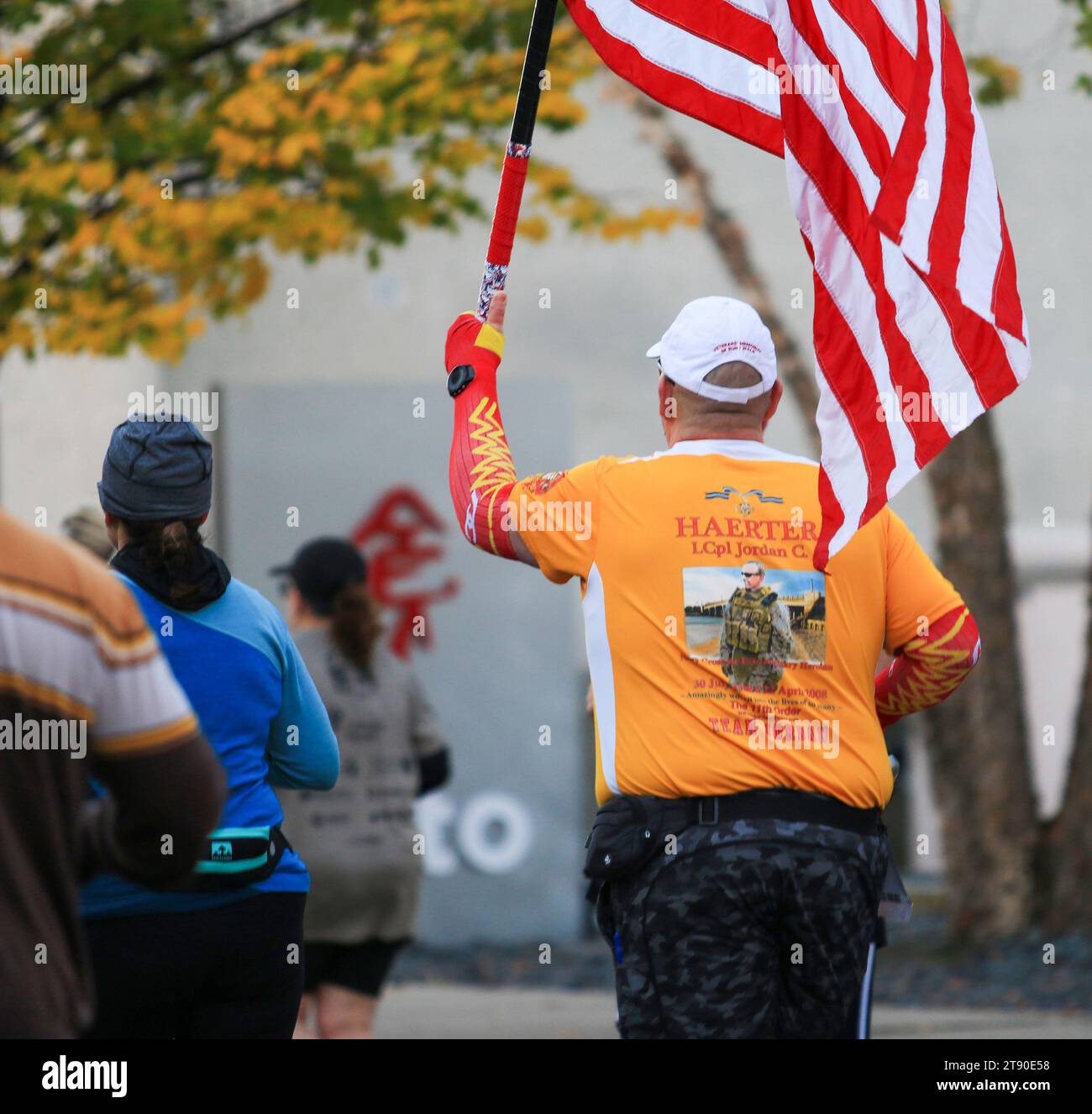 Babylon, New York, USA - 22 October 2023: A man holding an american ...