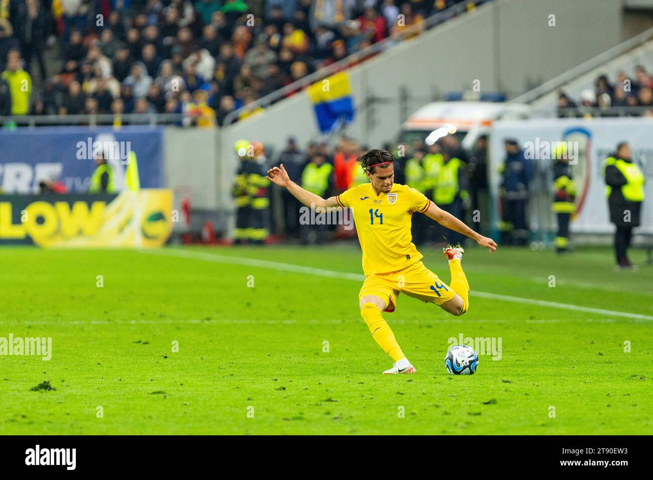Bucharest, Romania. 22nd Nov, 2023.Ianis Hagi of Romania shoots at goal ...