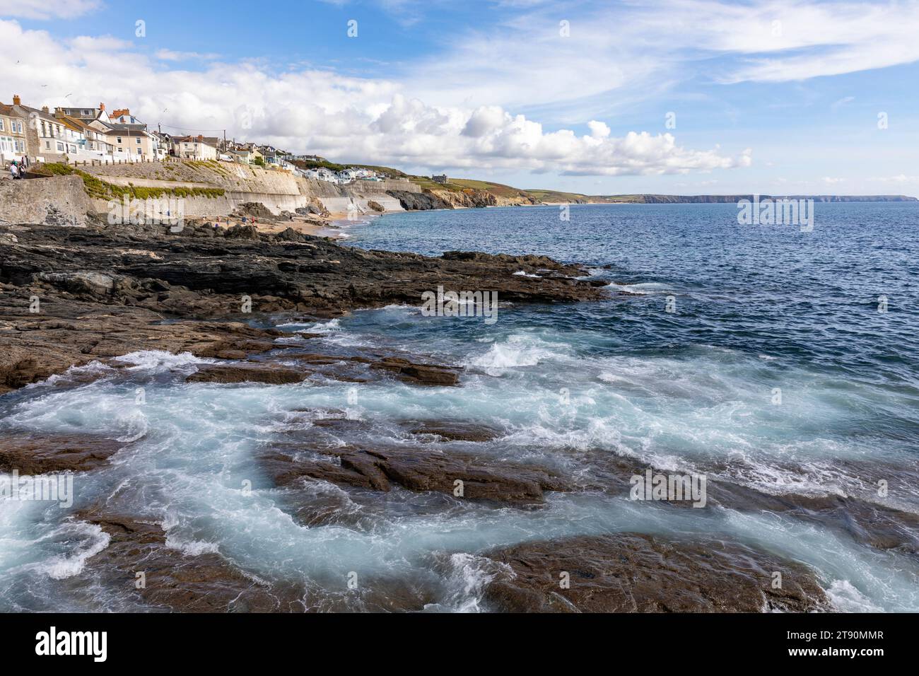 Porthleven fishing port town in Cornwall and rugged rocky beach ...