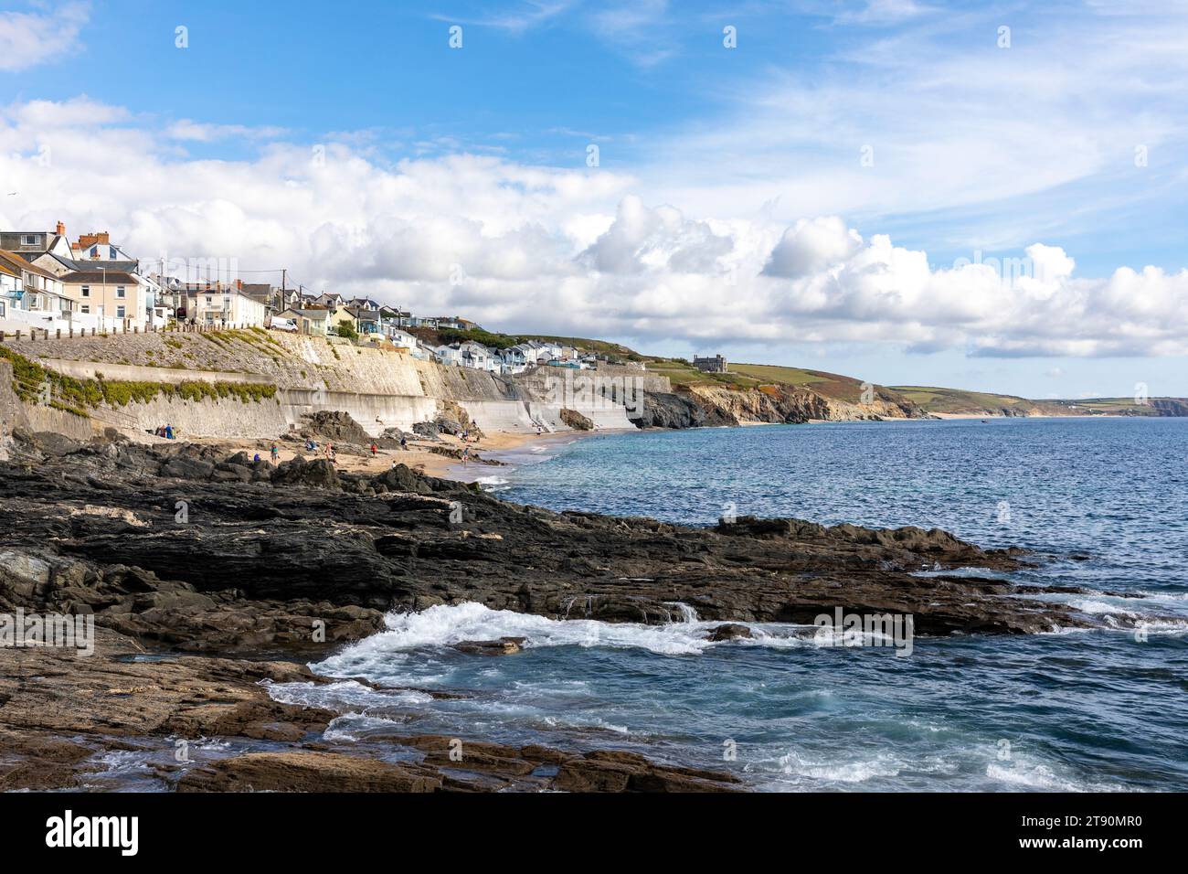 Porthleven fishing port town in Cornwall and rugged rocky beach ...