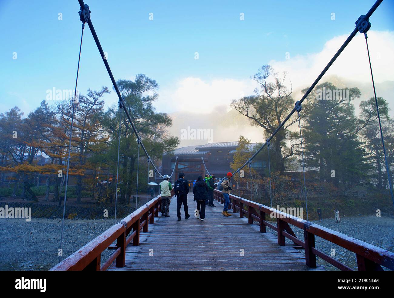 Tourists on the kappa wooden bridge at Kamikochi National park, the ...