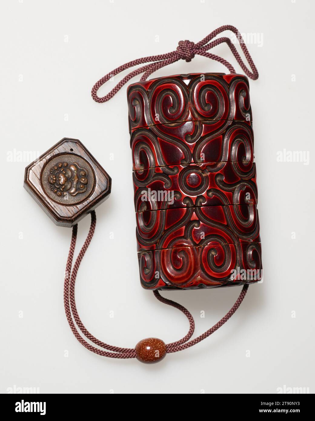 Four-case inro with carved lacquer decoration and netsuke of a box with ...