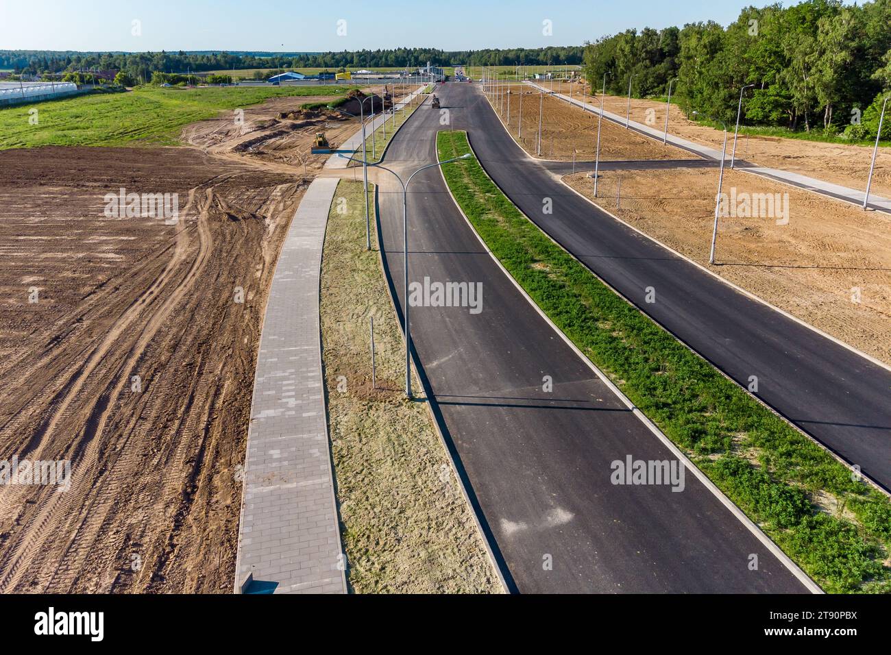 Construction of a new two-lane highway, aerial view Stock Photo - Alamy