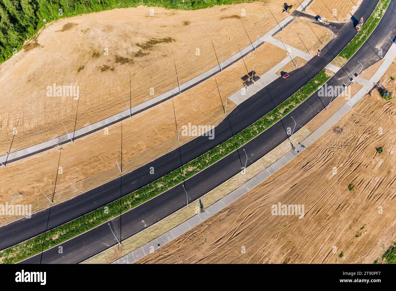 Construction of a new two-lane highway, aerial view Stock Photo - Alamy