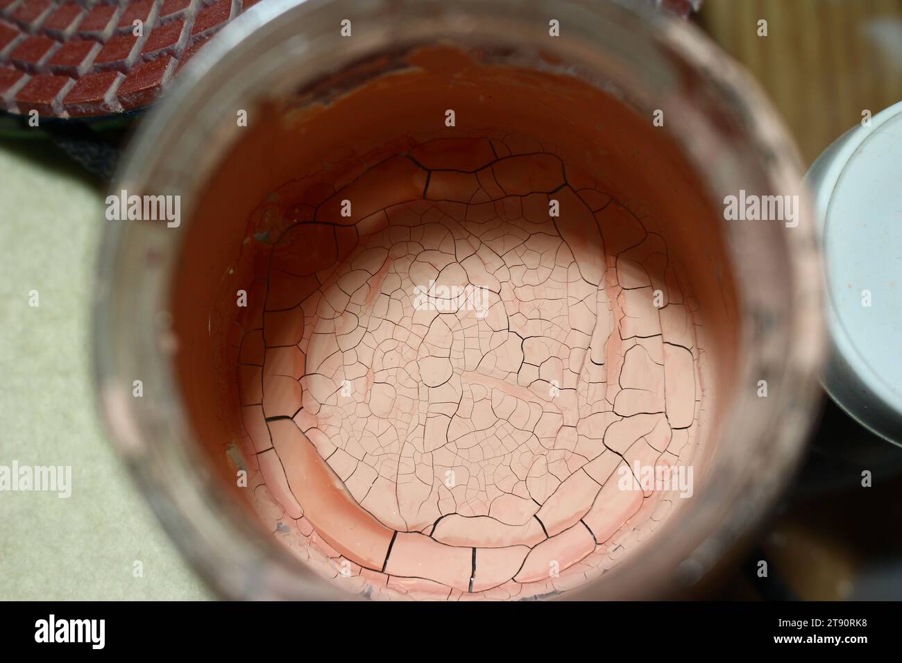 Dried and cracked pink powder at the bottom of a glass jar Stock Photo ...