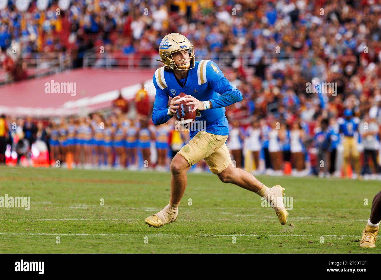 UCLA Bruins quarterback Ethan Garbers (4) rolls out to pass during an ...
