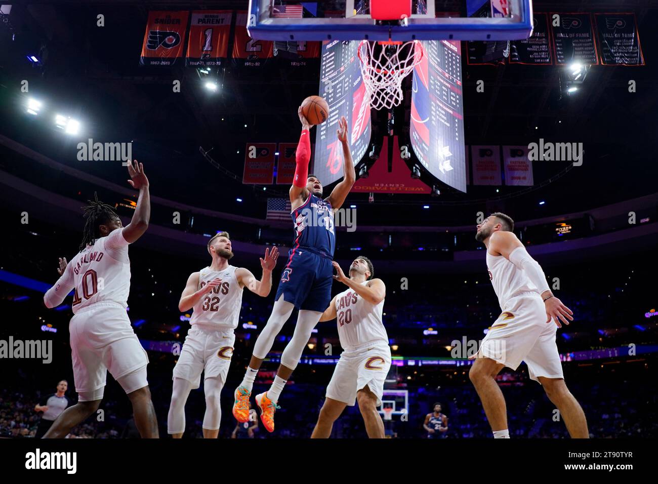 Philadelphia 76ers' Tobias Harris (12) goes up for a shot between ...