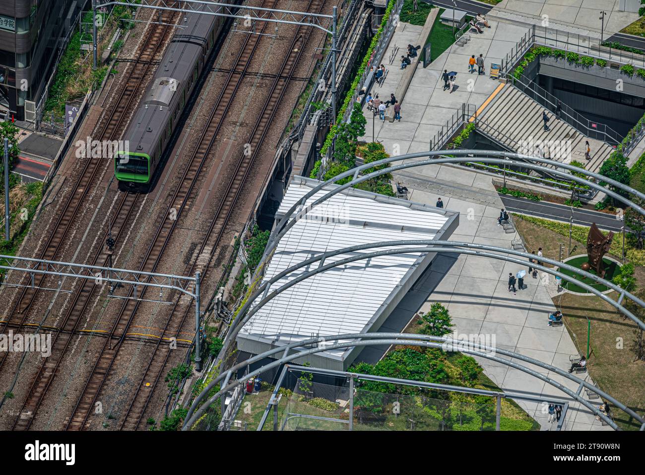 JR Yamanote line running in Shibuya Stock Photo - Alamy