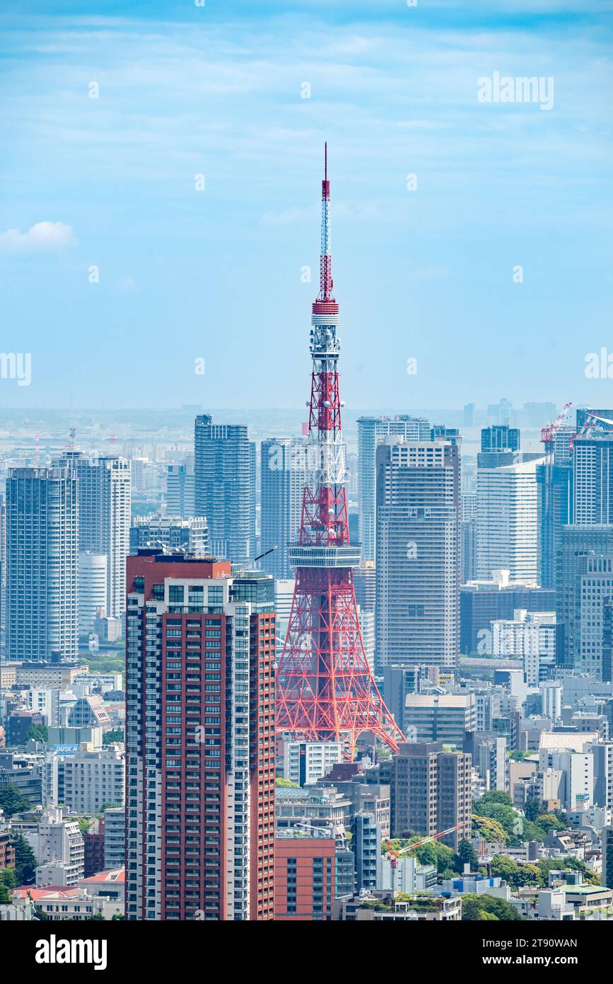 Tokyo Tower rising above the many skyscrapers in Tokyo Japan Stock ...