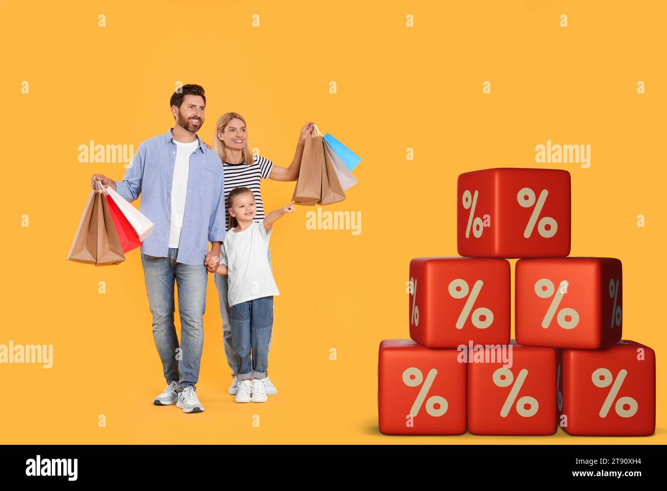 Discount offer. Happy family with paper shopping bags on orange ...