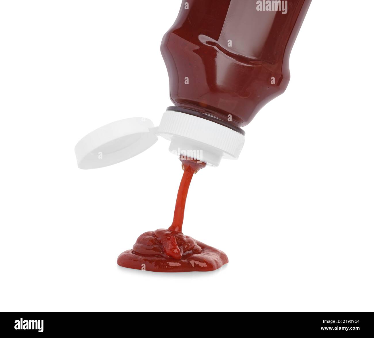 Pouring tasty red ketchup from bottle isolated on white Stock Photo - Alamy