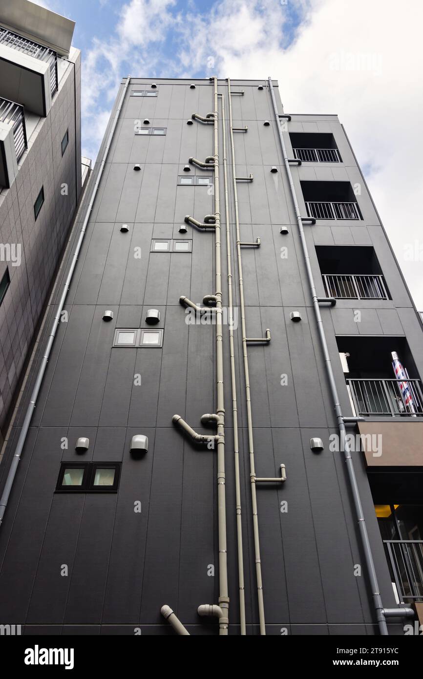 picture of a facade of a Japanese residential building with external ...