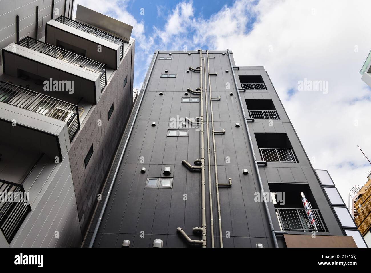 picture of a facade of a Japanese residential building with external ...