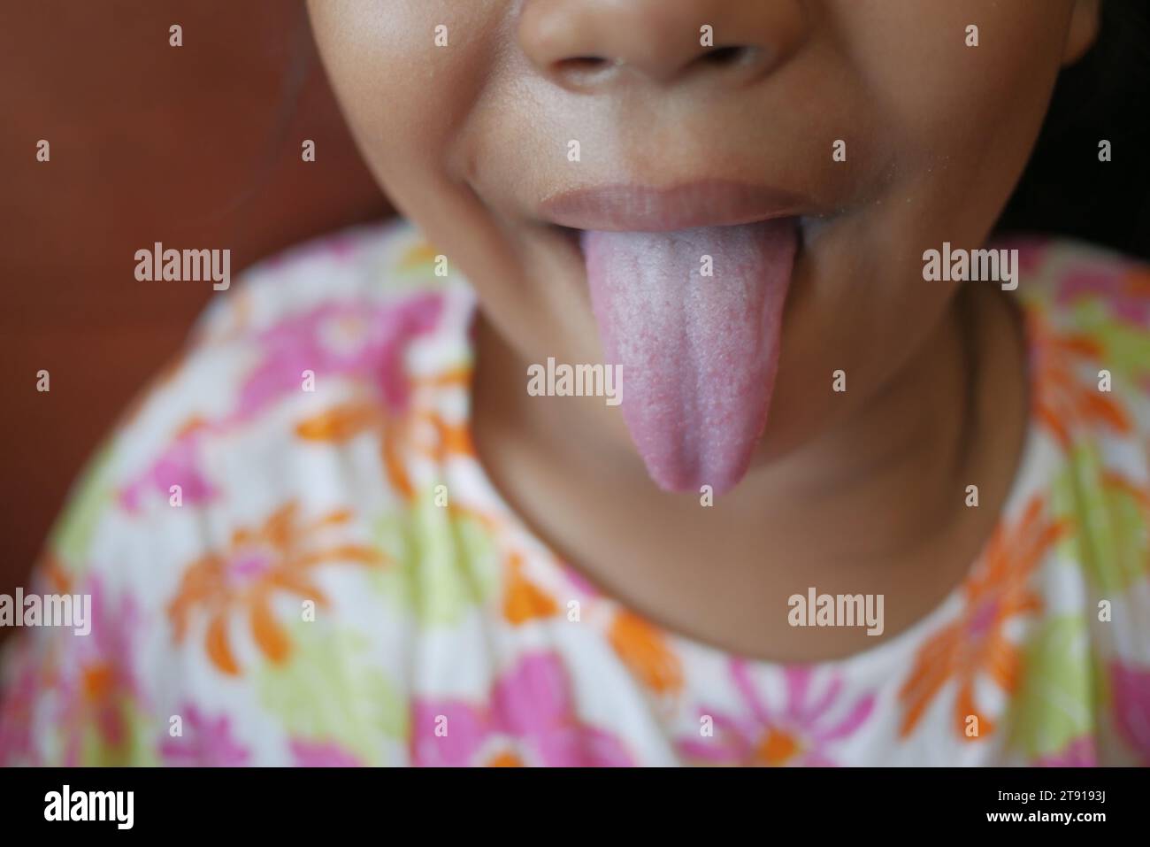 child shows his tongue closeup Stock Photo - Alamy