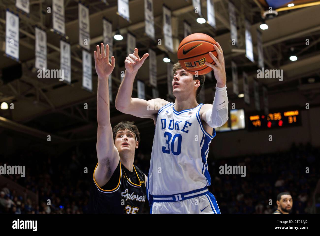 Duke's Kyle Filipowski (30) jumps for a shot ahead of La Salle's Rokas ...