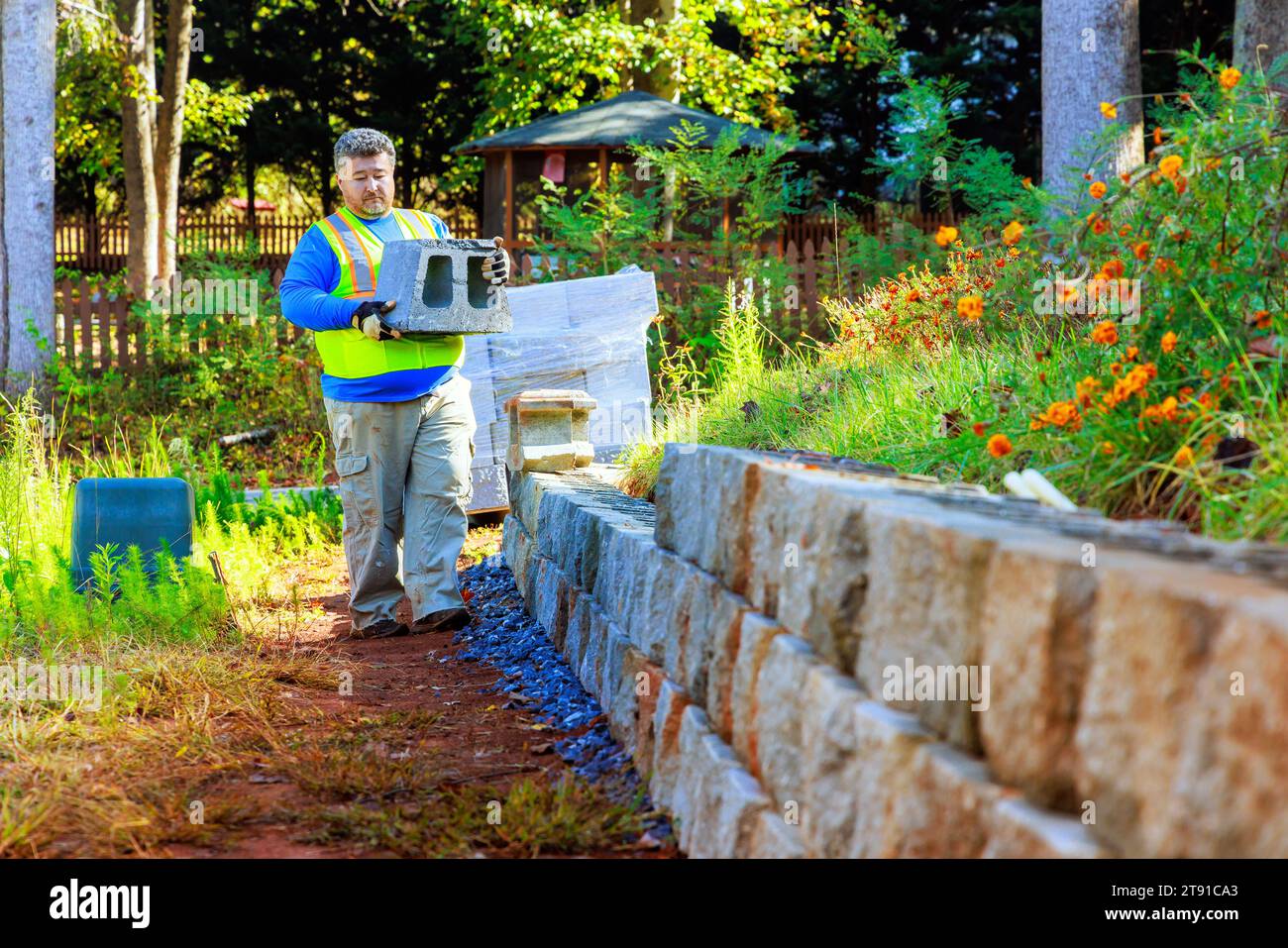 Contractor was installing new walls on construction site of large block ...