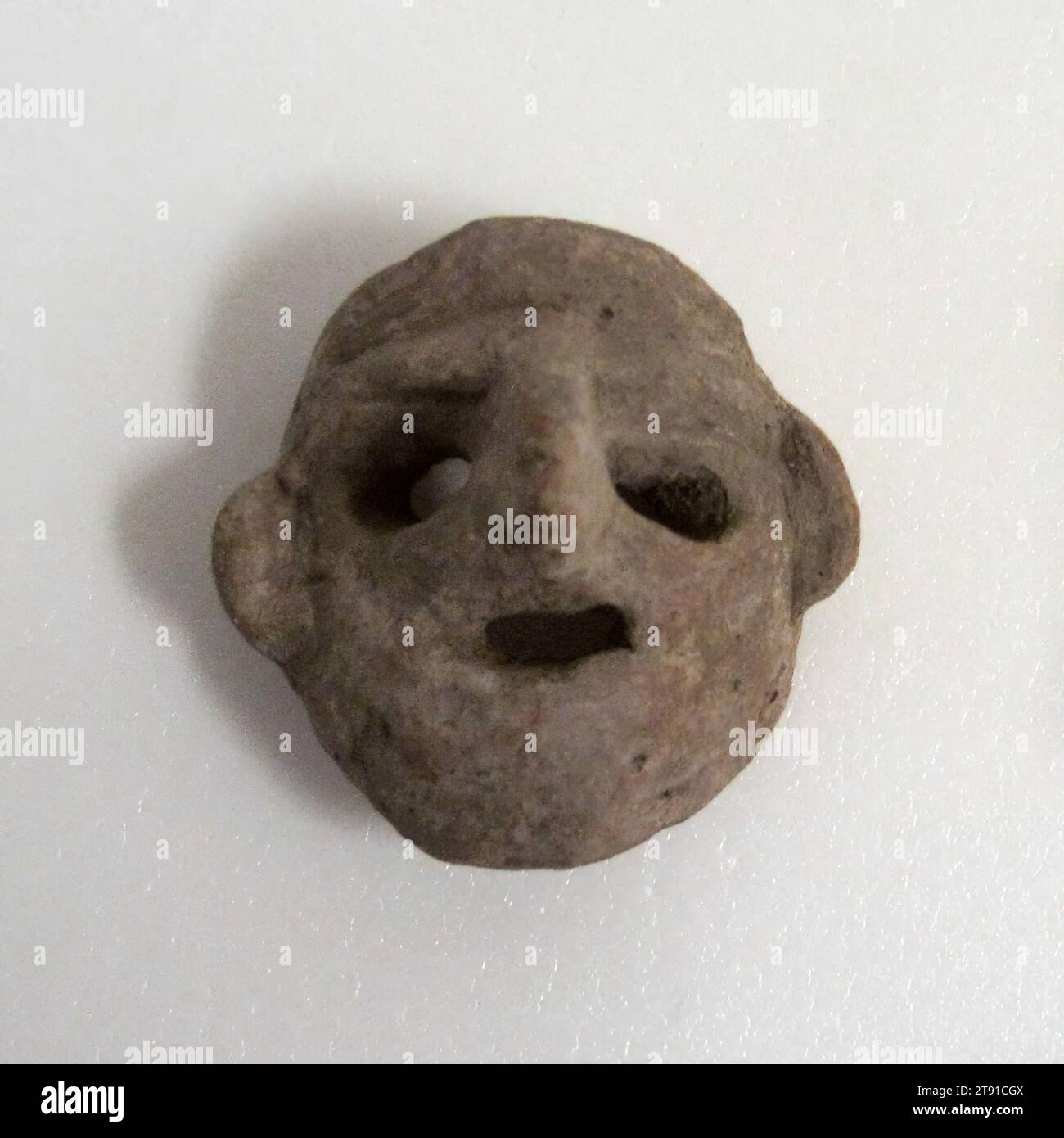 Miniature mask, 1500 BCE, Earthenware, Mexico, Pre-Classic Stock Photo ...