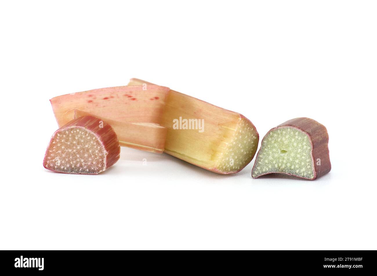 Rhubarb stalks of varying colors from pale green to deep red isolated ...