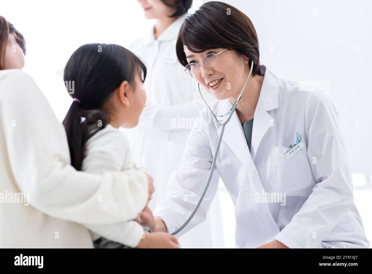 patient and doctor in examination room Stock Photo - Alamy