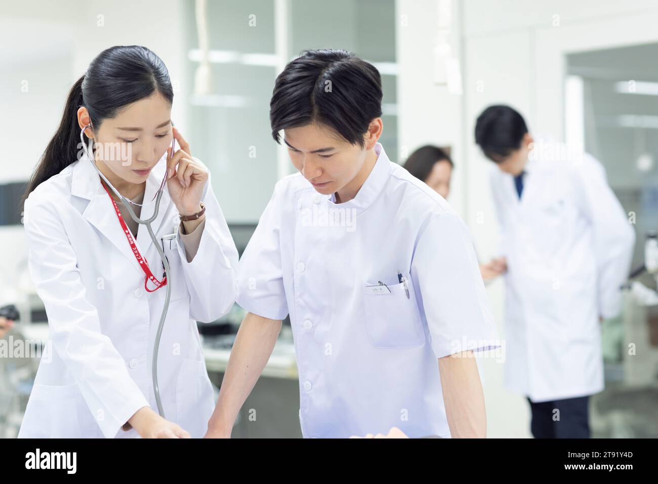 Medical examination doctor examining heart hi-res stock photography and ...