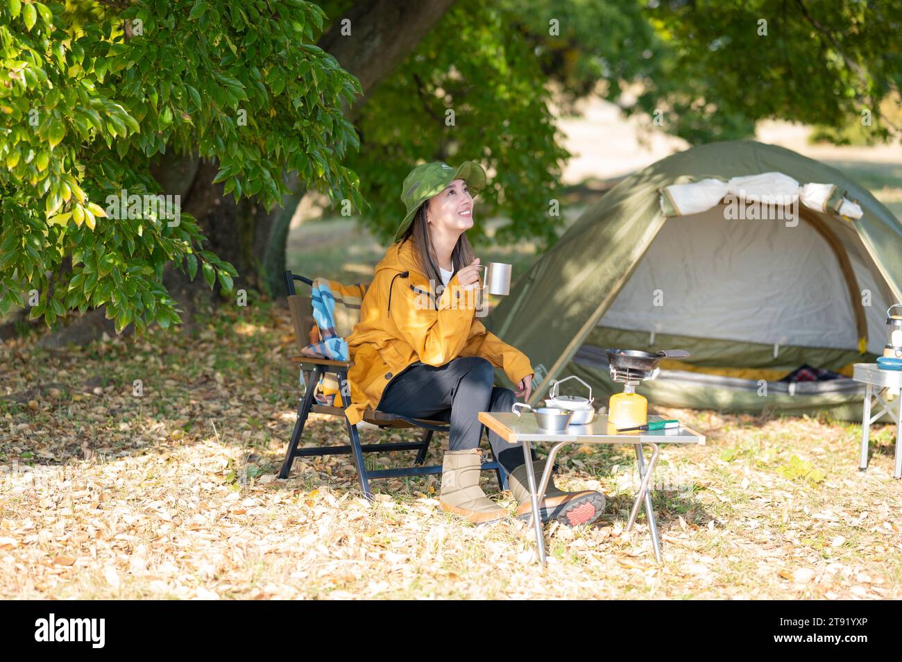 One woman camping sun tent hi-res stock photography and images - Alamy