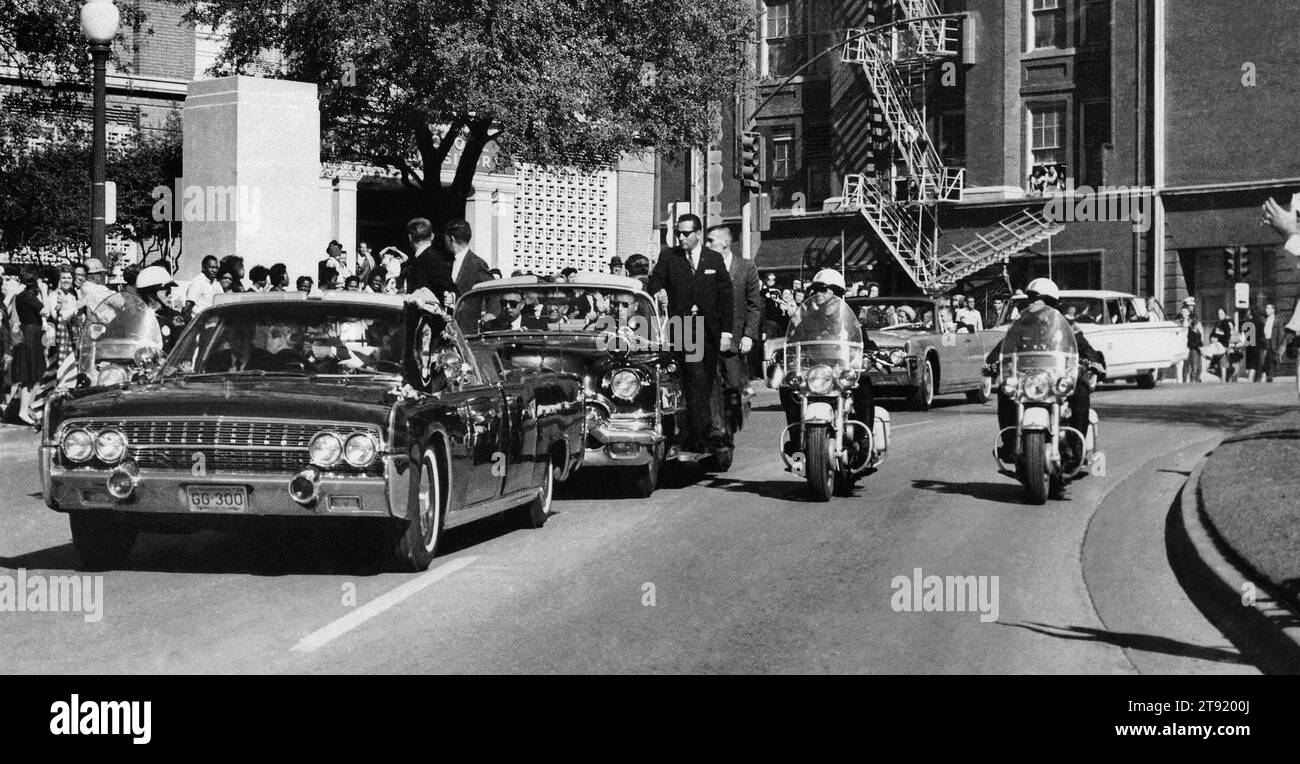 FILE - Seen through the foreground convertible's windshield, President ...