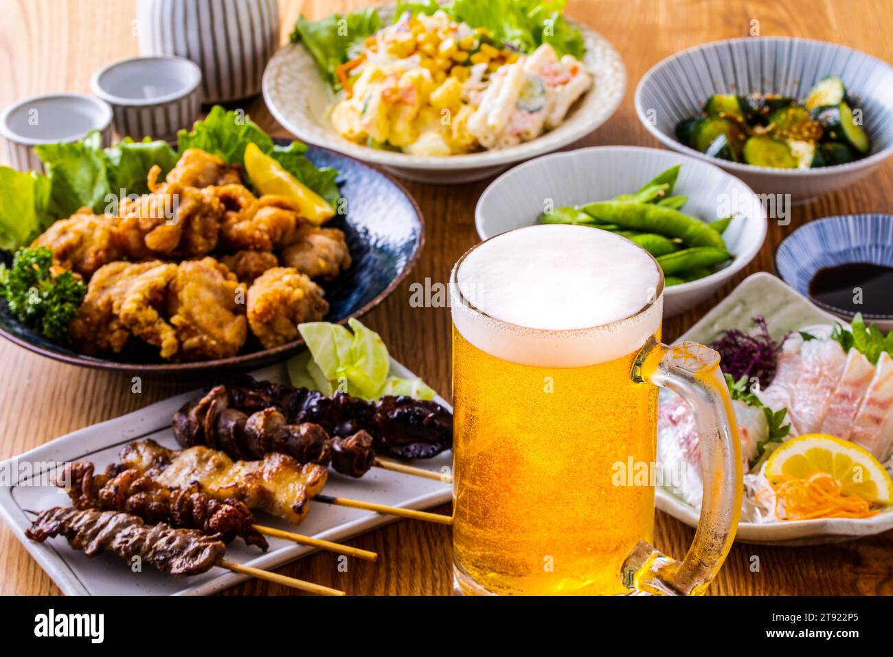 Draft beer and food at a Japanese izakaya Stock Photo - Alamy