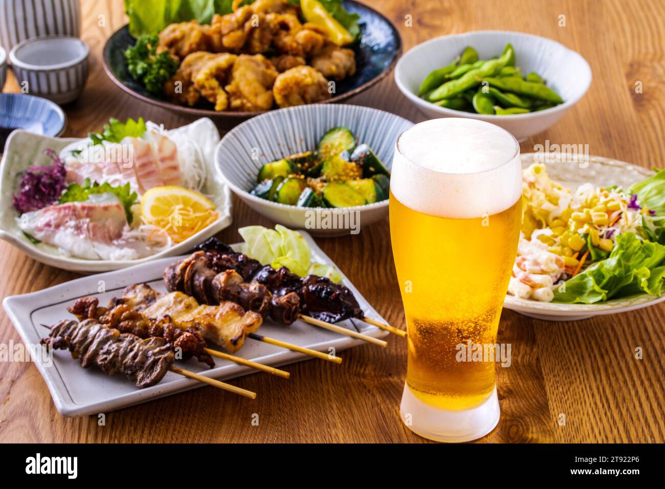 Draft beer and food at a Japanese izakaya Stock Photo - Alamy