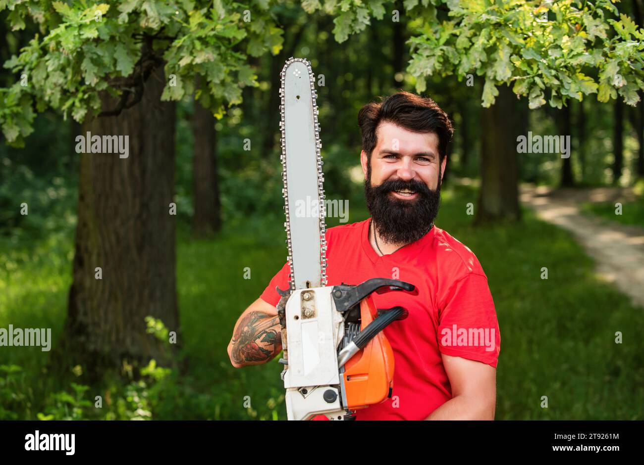 Stylish young man posing like lumberjack. Lumberjack worker standing in ...