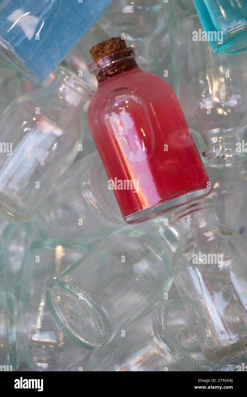 Set of Empty small transparent bottles in a box Stock Photo - Alamy