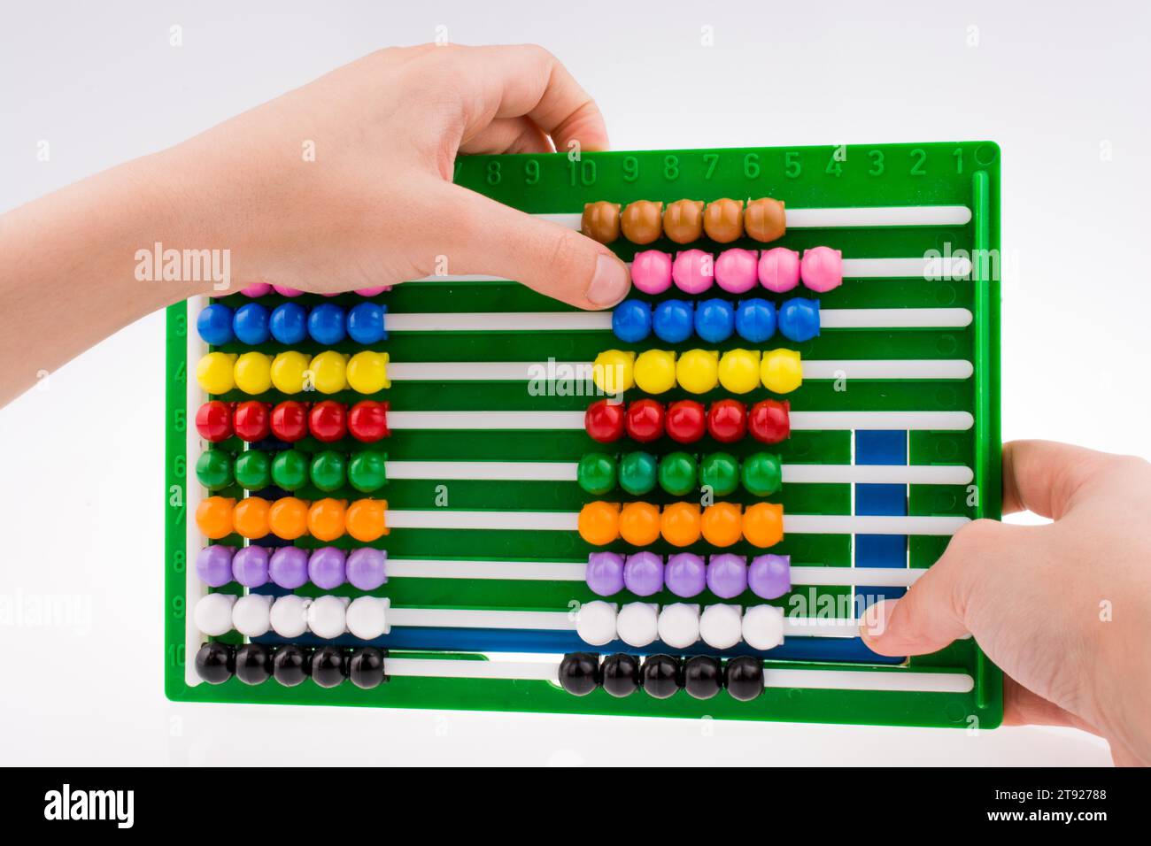 Hand using a color abacus Stock Photo - Alamy