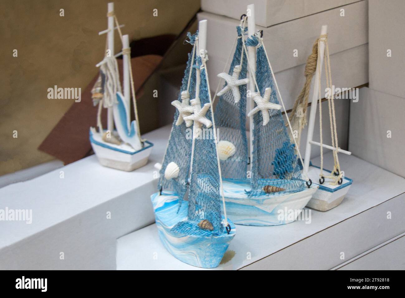 Set of small colorful model boats Stock Photo - Alamy
