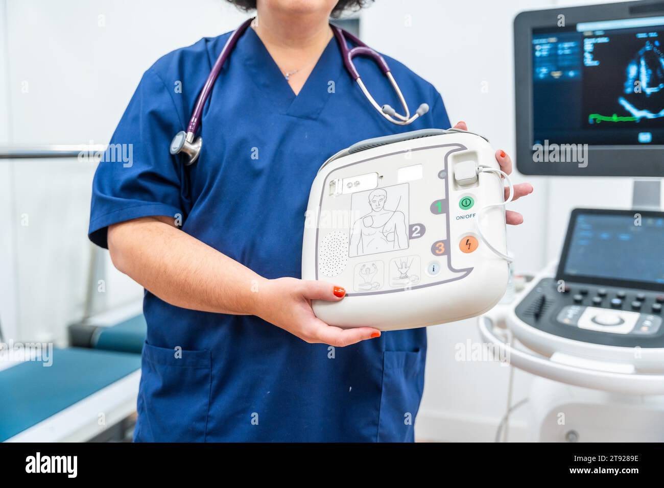 Close-up of an unrecognizable cardiologist explaining how a small ...