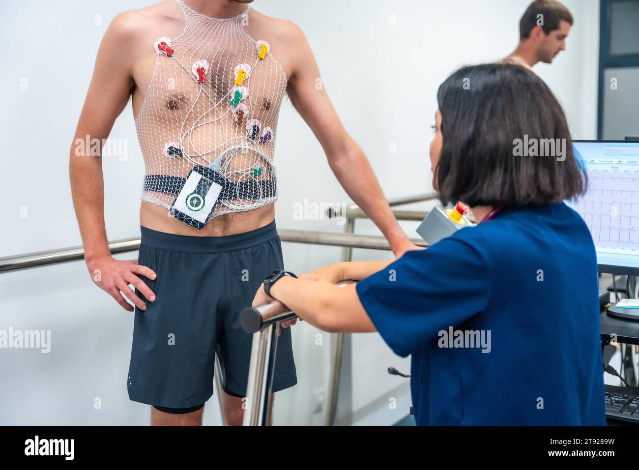 Cardiologist and doctor talking after performing a cardiovascular ...