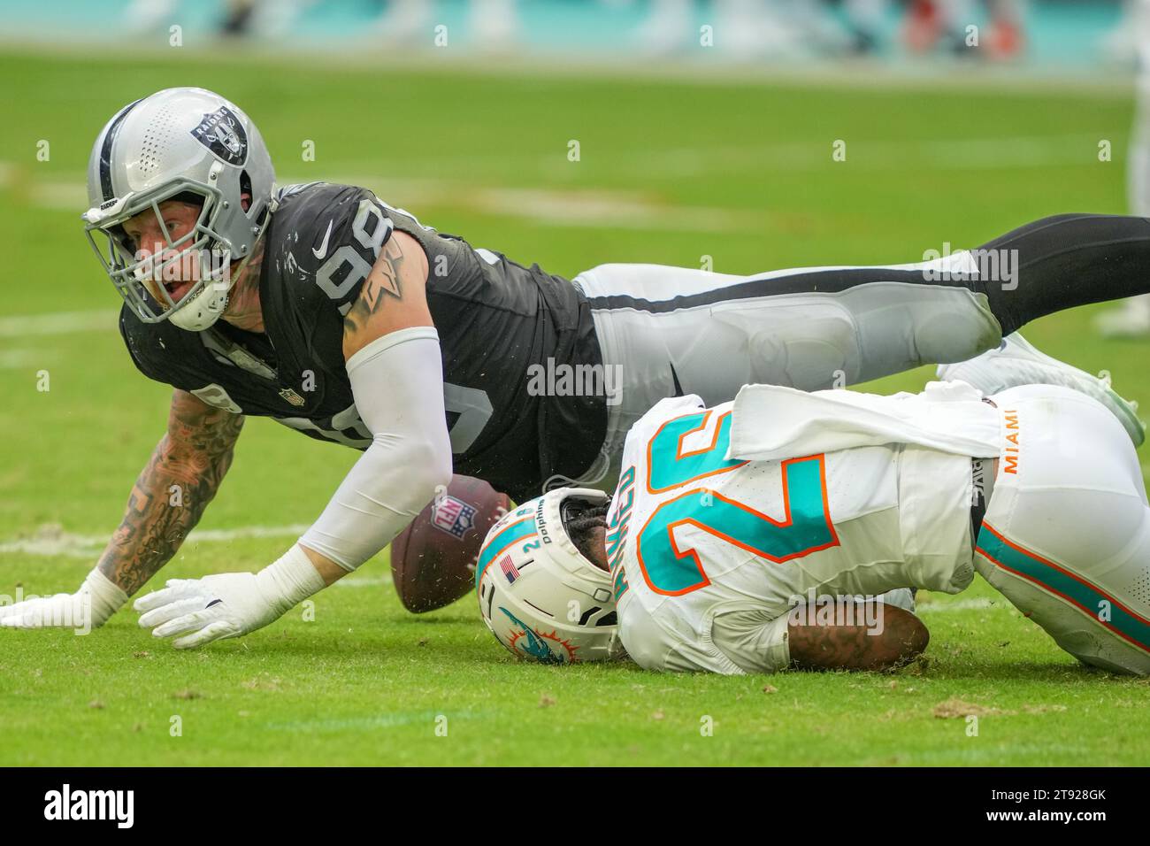 Las Vegas Raiders defensive end Maxx Crosby (98) forces a fumble during ...