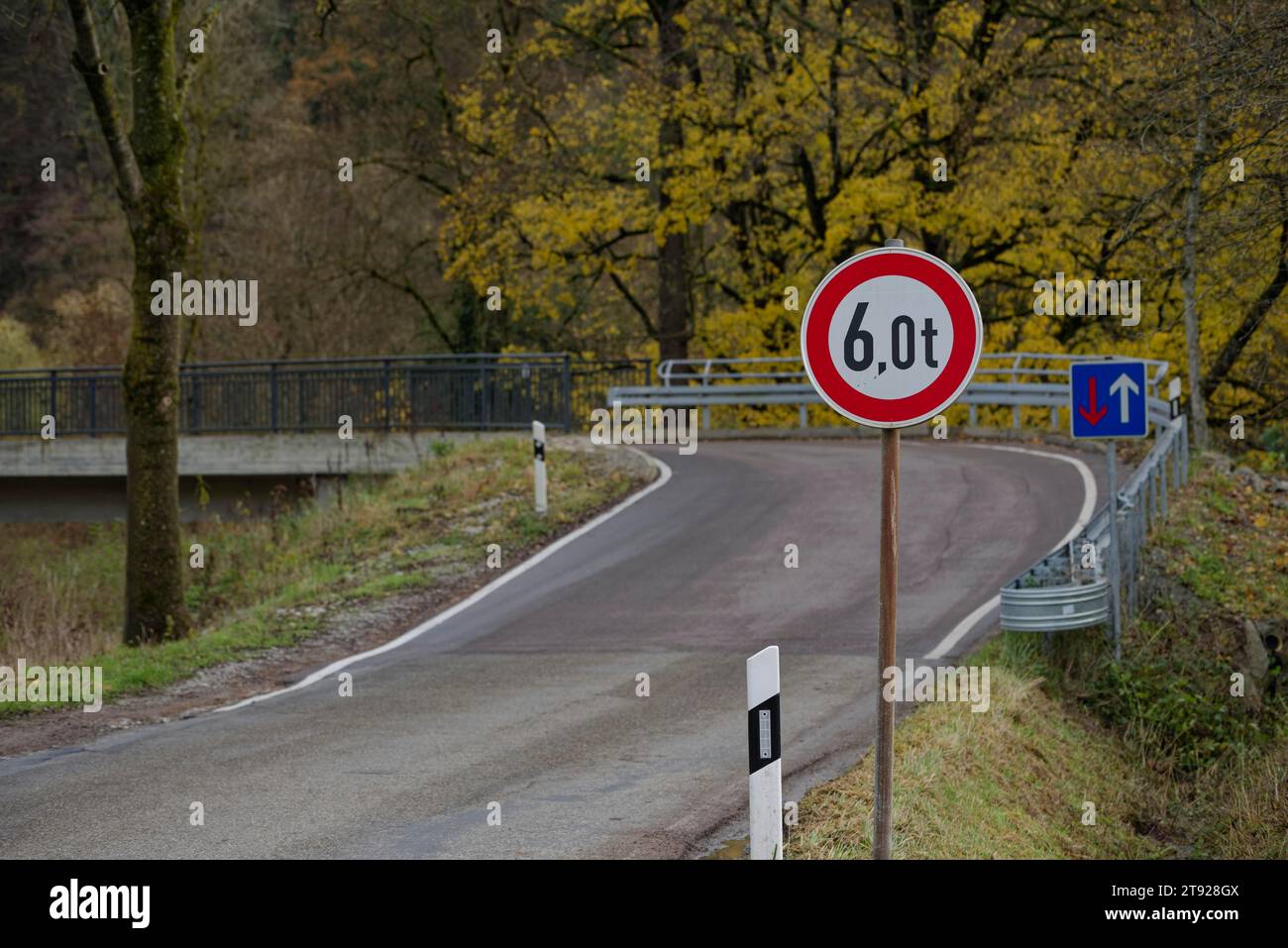 Signs with traffic regulations for weight restriction and right of way ...