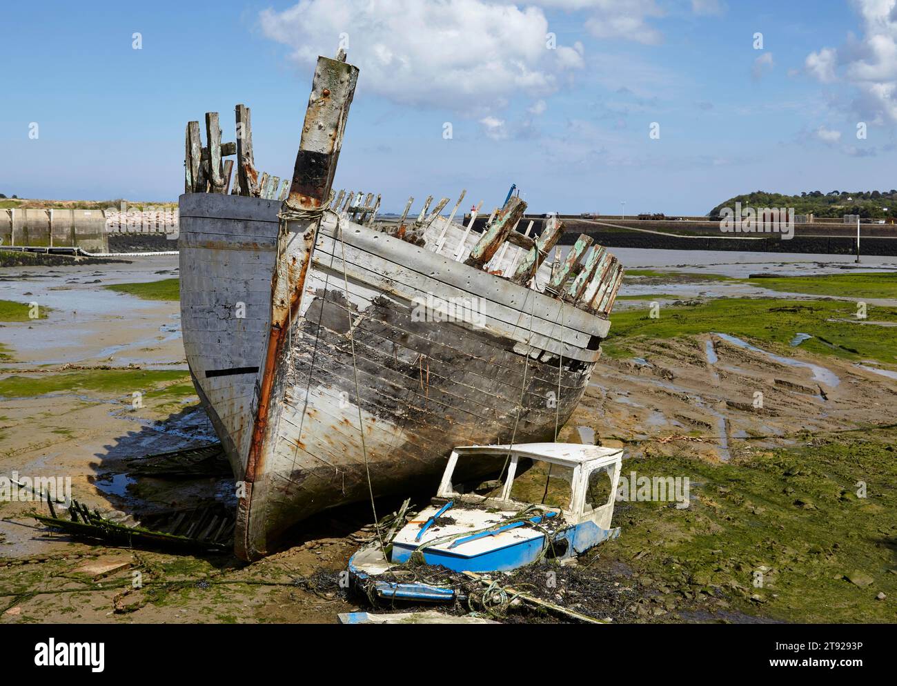 Old, rotting boats at low tide in the harbour of Paimpol, Cotes-d'Armor ...