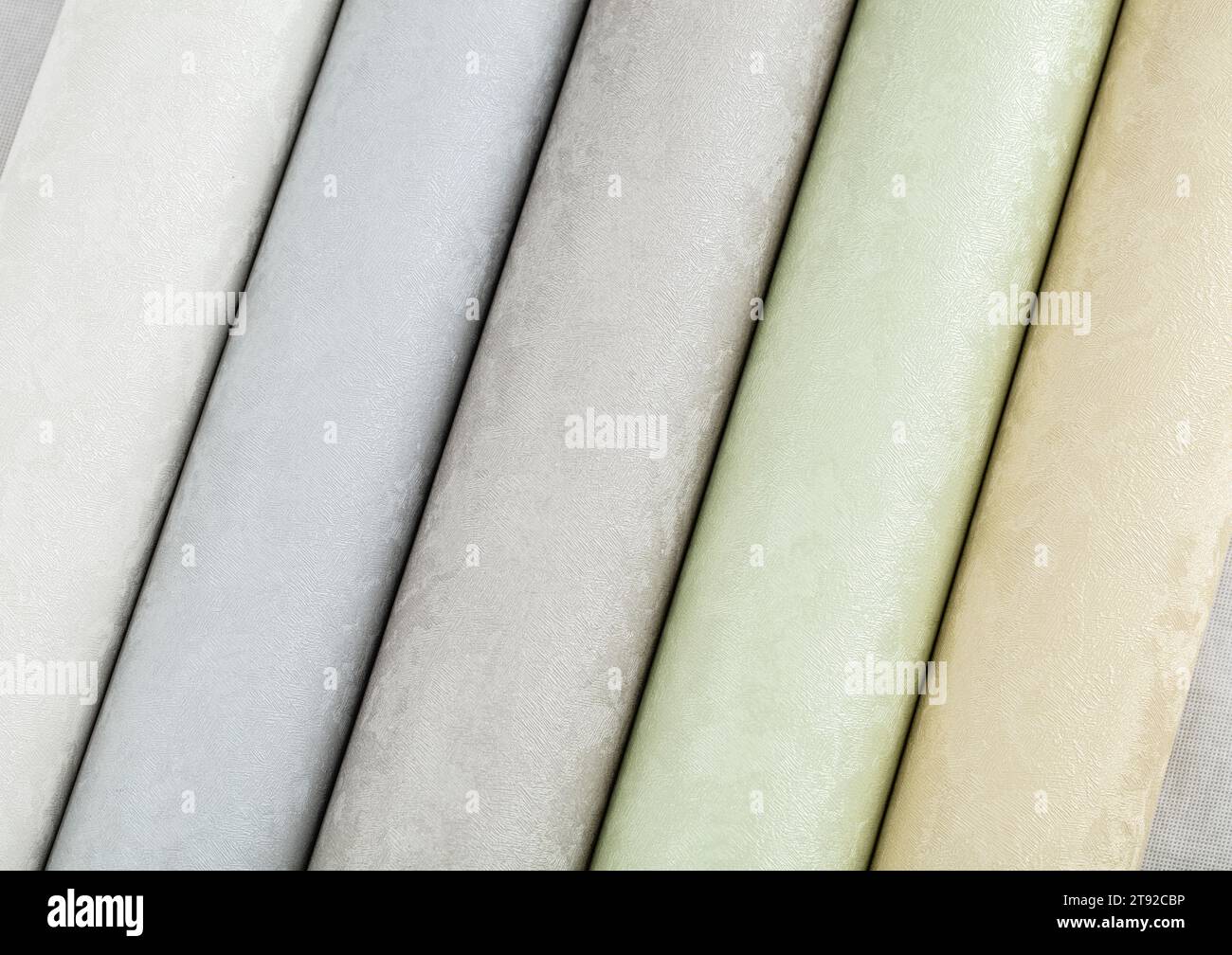 Paper wallpaper for gluing walls of different solid colors, rolled into ...