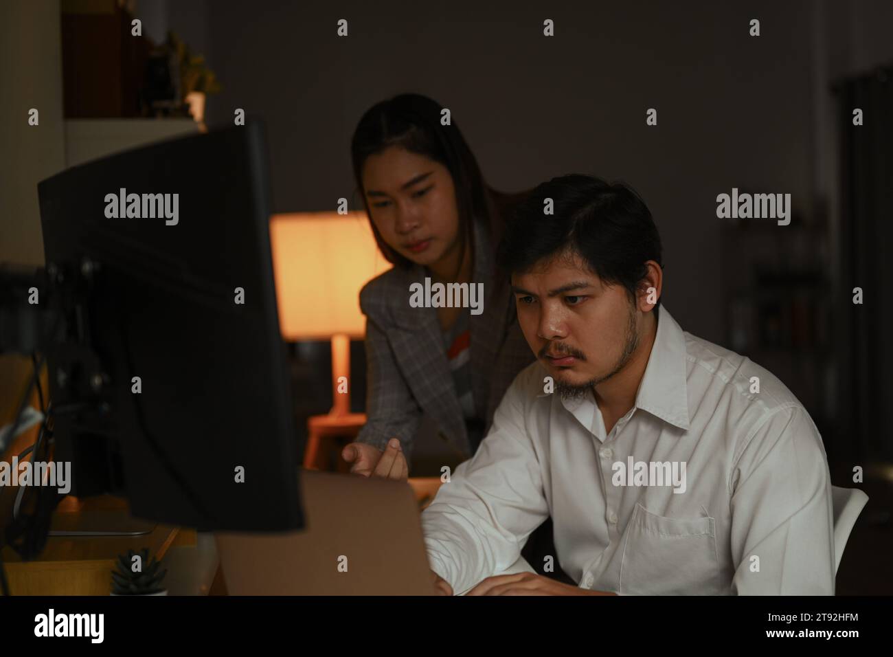 Software developers in data center hi-res stock photography and images ...